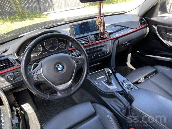 Black BMW 320 2013 in Riga, with an engine capacity of 2.00 L and mileage of 257 thousand km for 9150 €, photo 7 on AUTOMOTO.COM.LV