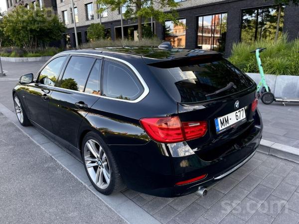 Black BMW 320 2013 in Riga, with an engine capacity of 2.00 L and mileage of 285 thousand km for 8450 €, photo 4 on AUTOMOTO.COM.LV