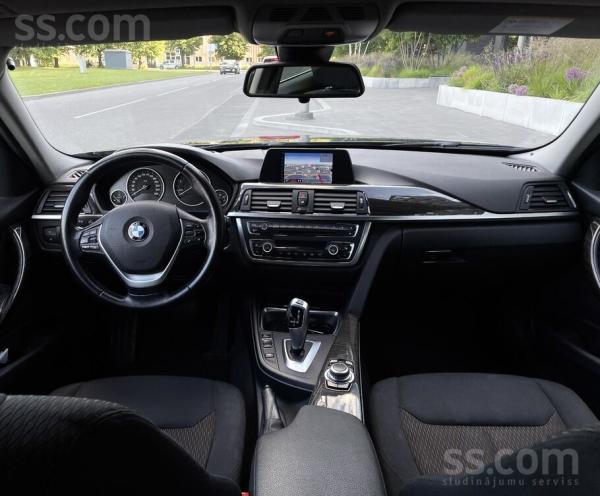 Black BMW 320 2013 in Riga, with an engine capacity of 2.00 L and mileage of 285 thousand km for 8450 €, photo 5 on AUTOMOTO.COM.LV