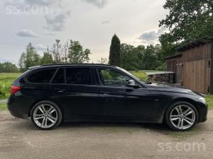 Black BMW 320 2013 in Riga, with an engine capacity of 2.00 L and mileage of 270 thousand km for 8800 €, photo 12 on AUTOMOTO.COM.LV