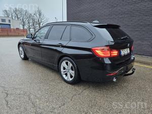Black BMW 320 2013 in Cesis, with an engine capacity of 2.00 L and mileage of 243 thousand km for 8800 €, photo 6 on AUTOMOTO.COM.LV