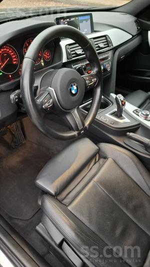 Black BMW 320 2013 in Riga, with an engine capacity of 2.00 L and mileage of 250 thousand km for 10650 €, photo 11 on AUTOMOTO.COM.LV