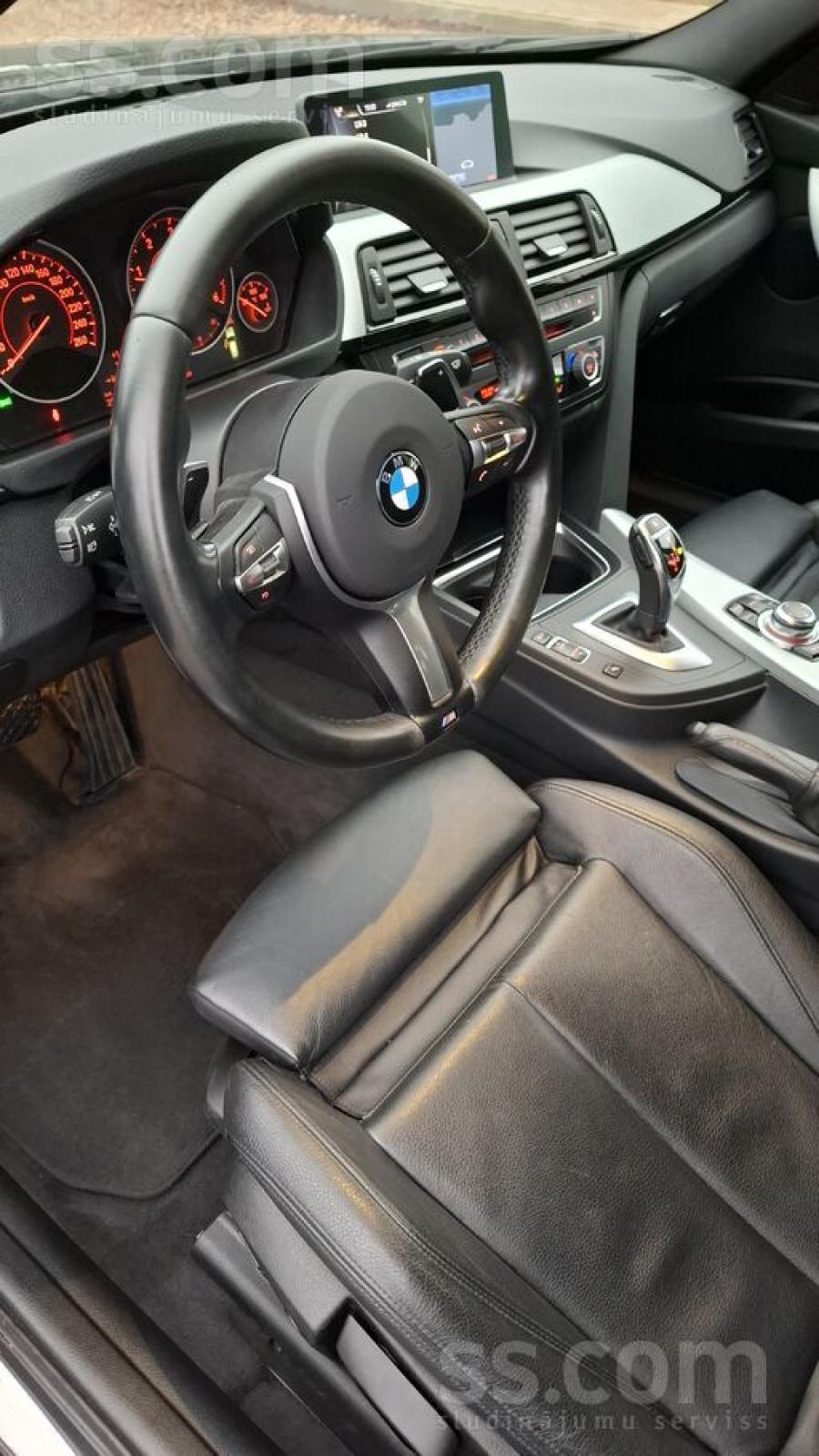 Black BMW 320 2013 in Riga, with an engine capacity of 2.00 L and mileage of 250 thousand km for 10650 €, photo 11 on AUTOMOTO.COM.LV