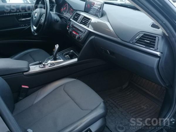 Black BMW 320 2013 in Valmiera, with an engine capacity of 2.00 L and mileage of 323 thousand km for 7550 €, photo 10 on AUTOMOTO.COM.LV