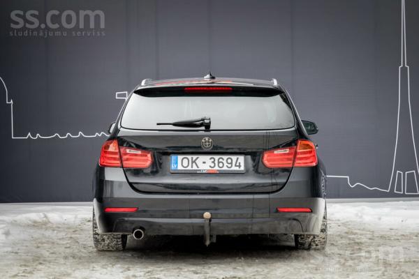 Black BMW 320 2013 in Riga, with an engine capacity of 2.00 L and mileage of 284 thousand km for 8990 €, photo 7 on AUTOMOTO.COM.LV