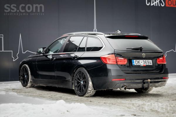 Black BMW 320 2013 in Riga, with an engine capacity of 2.00 L and mileage of 284 thousand km for 8990 €, photo 8 on AUTOMOTO.COM.LV