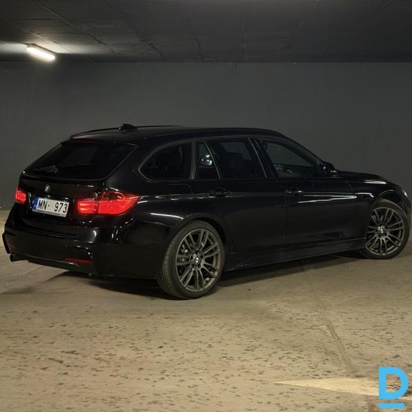 Black BMW 320 2013 in Riga, with an engine capacity of 2.00 L and mileage of 236 thousand km for 10500 €, photo 5 on AUTOMOTO.COM.LV