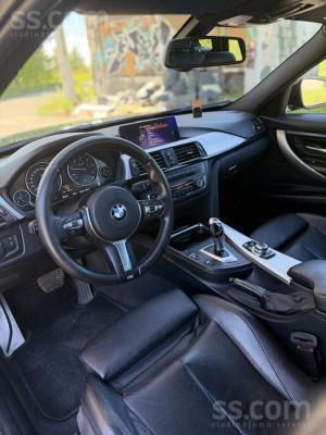 Black BMW 320 2013 in Riga, with an engine capacity of 2.00 L and mileage of 265 thousand km for 9150 €, photo 8 on AUTOMOTO.COM.LV