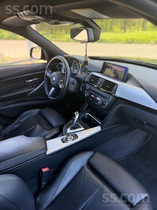 Black BMW 320 2013 in Riga, with an engine capacity of 2.00 L and mileage of 265 thousand km for 9150 €, photo 8 on AUTOMOTO.COM.LV
