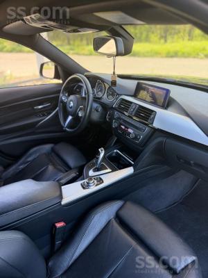 Black BMW 320 2013 in Riga, with an engine capacity of 2.00 L and mileage of 265 thousand km for 9150 €, photo 9 on AUTOMOTO.COM.LV