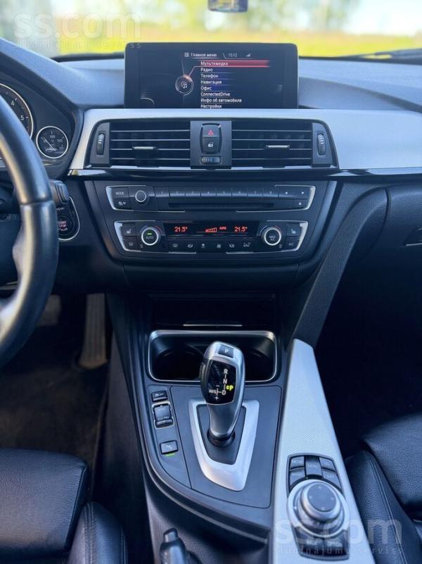 Black BMW 320 2013 in Riga, with an engine capacity of 2.00 L and mileage of 265 thousand km for 9150 €, photo 9 on AUTOMOTO.COM.LV