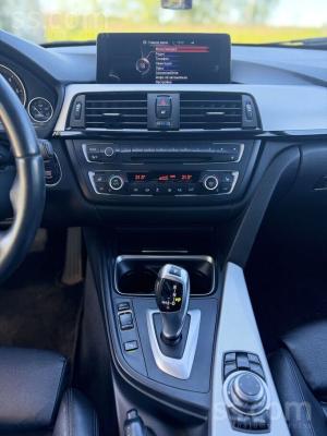 Black BMW 320 2013 in Riga, with an engine capacity of 2.00 L and mileage of 265 thousand km for 9150 €, photo 10 on AUTOMOTO.COM.LV