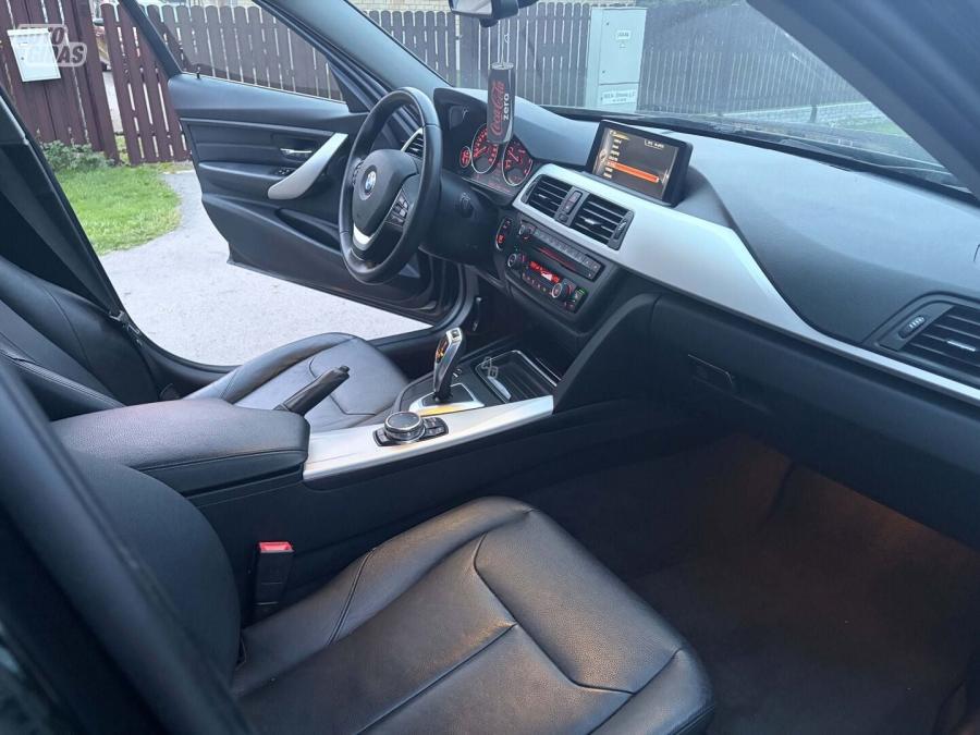 Black BMW 320 2013 in Siauliai, with an engine capacity of 2.00 L and mileage of 332 thousand km for 6550 €, photo 14 on AUTOMOTO.COM.LV
