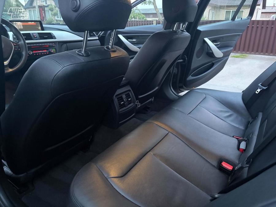 Black BMW 320 2013 in Siauliai, with an engine capacity of 2.00 L and mileage of 332 thousand km for 6550 €, photo 16 on AUTOMOTO.COM.LV