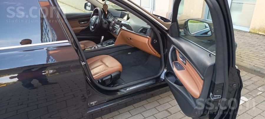Black BMW 320 2013 in Jelgava, with an engine capacity of 2.00 L and mileage of 278 thousand km for 10800 €, photo 12 on AUTOMOTO.COM.LV