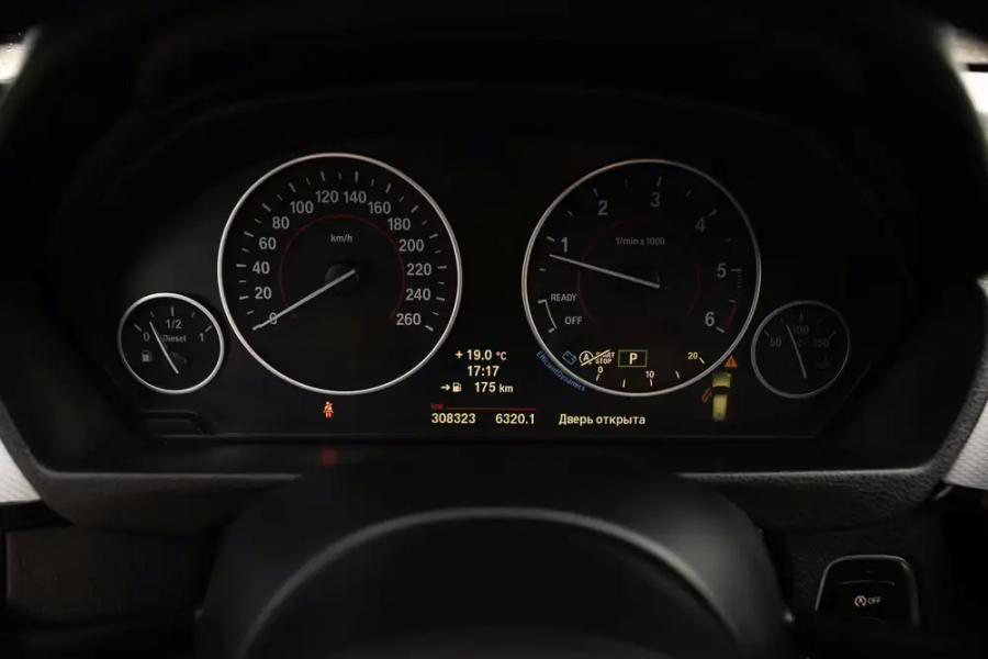 Black BMW 320 2013 in Jelgava, with an engine capacity of 2.00 L and mileage of 308 thousand km for 10300 €, photo 12 on AUTOMOTO.COM.LV