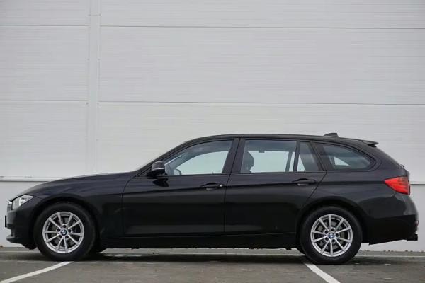 Black BMW 320 2013 in Riga, with an engine capacity of 2.00 L and mileage of 237 thousand km for 7600 €, photo 5 on AUTOMOTO.COM.LV