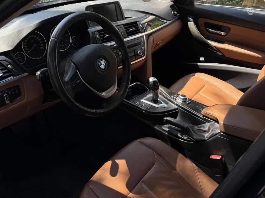 Black BMW 320 2013 in Marijampole, with an engine capacity of 2.00 L and mileage of 340 thousand km for 7700 €, photo 11 on AUTOMOTO.COM.LV