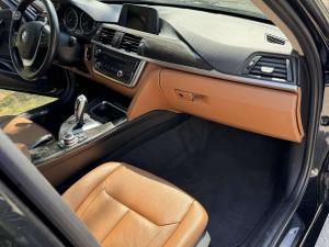 Black BMW 320 2013 in Marijampole, with an engine capacity of 2.00 L and mileage of 340 thousand km for 7700 €, photo 13 on AUTOMOTO.COM.LV