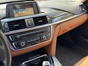 Black BMW 320 2013 in Marijampole, with an engine capacity of 2.00 L and mileage of 340 thousand km for 7700 €, photo 16 on AUTOMOTO.COM.LV