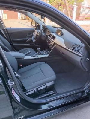 Black BMW 320 2013 in Taurage, with an engine capacity of 2.00 L and mileage of 300 thousand km for 4850 €, photo 13 on AUTOMOTO.COM.LV