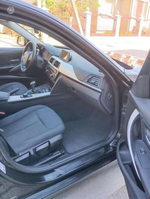 Black BMW 320 2013 in Taurage, with an engine capacity of 2.00 L and mileage of 300 thousand km for 4850 €, photo 14 on AUTOMOTO.COM.LV