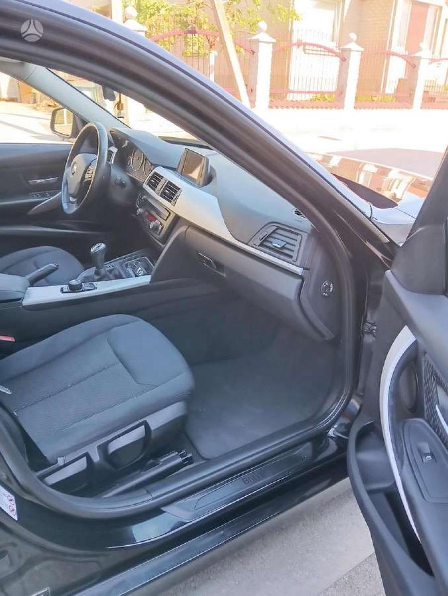 Black BMW 320 2013 in Taurage, with an engine capacity of 2.00 L and mileage of 300 thousand km for 4850 €, photo 14 on AUTOMOTO.COM.LV