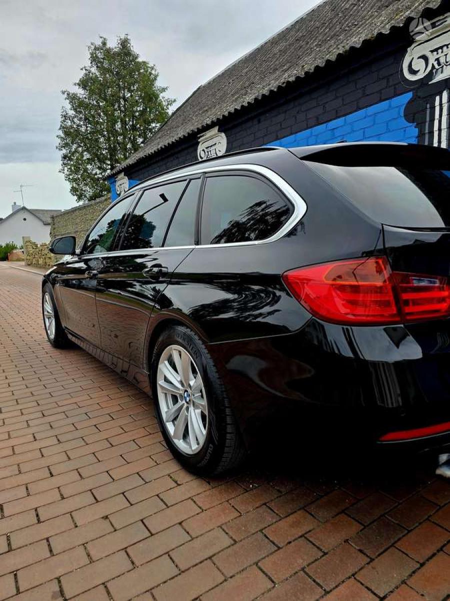 Black BMW 320 2013 in Marijampole, with an engine capacity of 2.00 L and mileage of 290 thousand km for 6750 €, photo 13 on AUTOMOTO.COM.LV