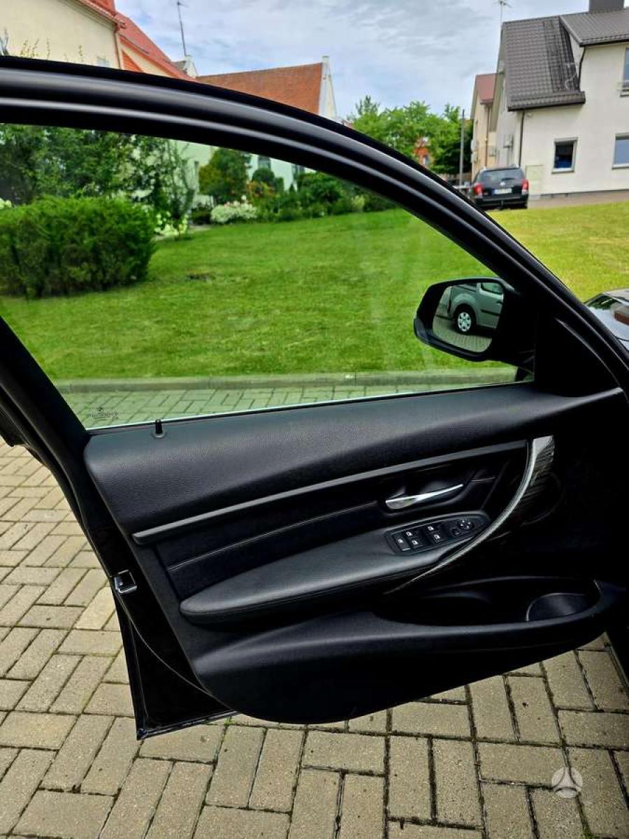 Black BMW 320 2013 in Marijampole, with an engine capacity of 2.00 L and mileage of 290 thousand km for 6750 €, photo 14 on AUTOMOTO.COM.LV