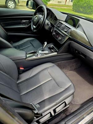 Black BMW 320 2013 in Marijampole, with an engine capacity of 2.00 L and mileage of 290 thousand km for 6750 €, photo 21 on AUTOMOTO.COM.LV