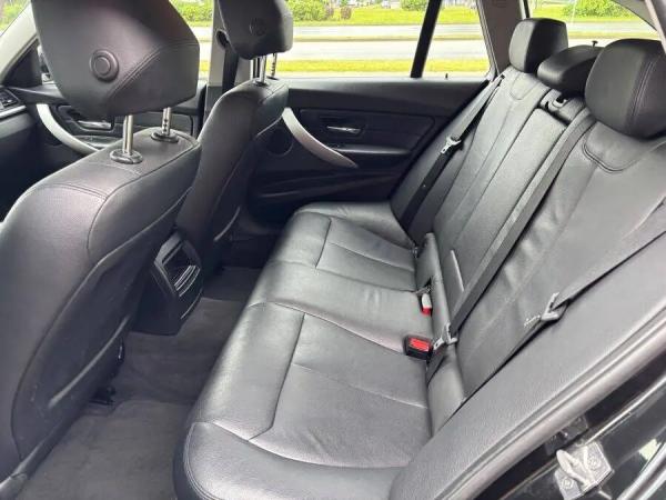 Black BMW 320 2013 in Riga, with an engine capacity of 2.00 L and mileage of 190 thousand km for 7950 €, photo 9 on AUTOMOTO.COM.LV