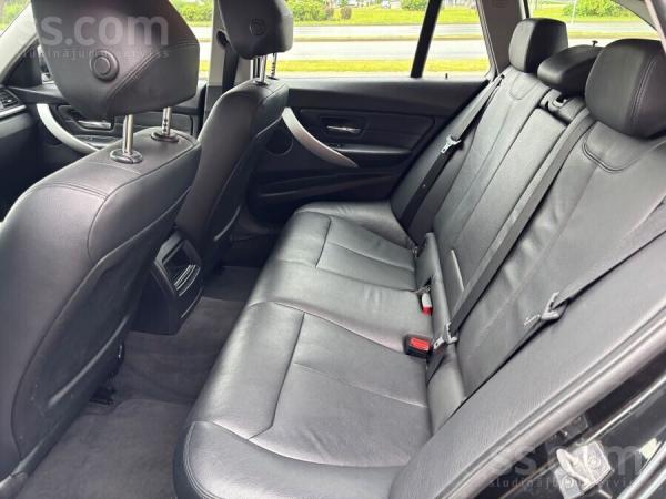 Black BMW 320 2013 in Riga, with an engine capacity of 2.00 L and mileage of 190 thousand km for 7950 €, photo 9 on AUTOMOTO.COM.LV