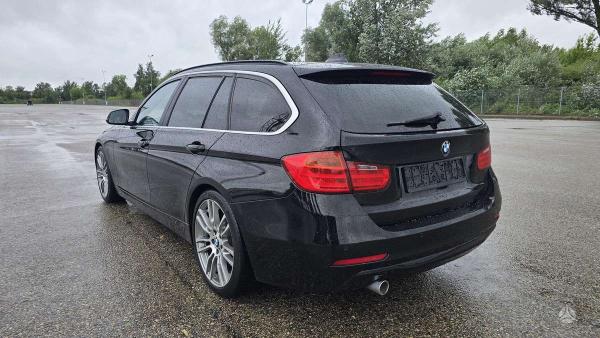 Black BMW 320 2013 in Marijampole, with an engine capacity of 2.00 L and mileage of 305 thousand km for 6499 €, photo 5 on AUTOMOTO.COM.LV