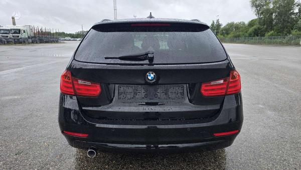 Black BMW 320 2013 in Marijampole, with an engine capacity of 2.00 L and mileage of 305 thousand km for 6499 €, photo 6 on AUTOMOTO.COM.LV