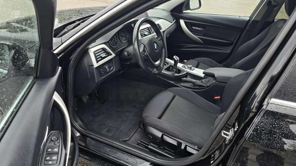 Black BMW 320 2013 in Marijampole, with an engine capacity of 2.00 L and mileage of 305 thousand km for 6499 €, photo 10 on AUTOMOTO.COM.LV