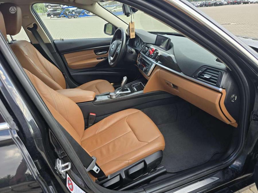 Black BMW 320 2013 in Marijampole, with an engine capacity of 2.00 L and mileage of 319 thousand km for 7750 €, photo 12 on AUTOMOTO.COM.LV