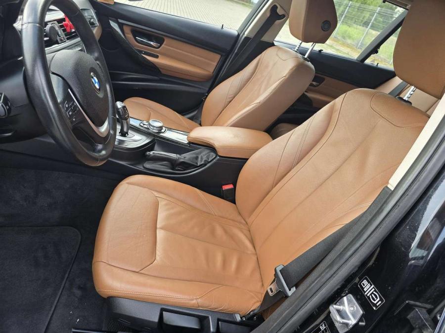 Black BMW 320 2013 in Marijampole, with an engine capacity of 2.00 L and mileage of 319 thousand km for 7750 €, photo 15 on AUTOMOTO.COM.LV
