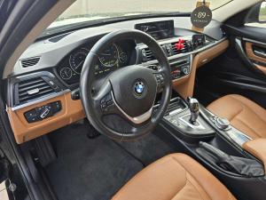 Black BMW 320 2013 in Marijampole, with an engine capacity of 2.00 L and mileage of 319 thousand km for 7750 €, photo 16 on AUTOMOTO.COM.LV