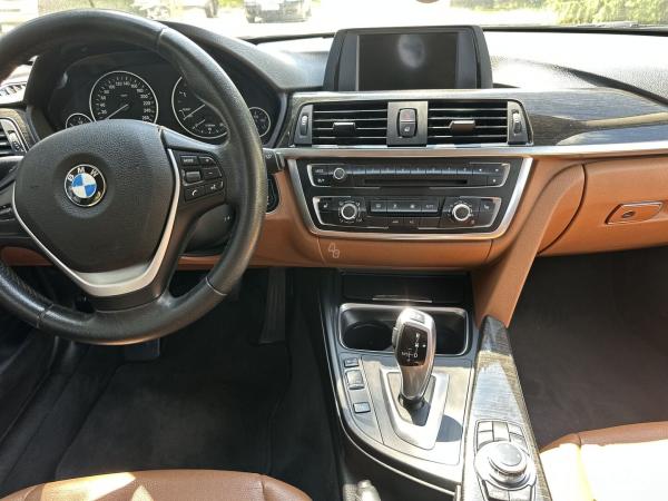 Black BMW 320 2013 in Marijampole, with an engine capacity of 2.00 L and mileage of 340 thousand km for 6999 €, photo 10 on AUTOMOTO.COM.LV