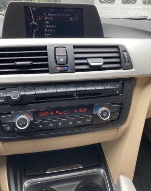 Black BMW 320 2013 in Vilnius, with an engine capacity of 2.00 L and mileage of 295 thousand km for 4899 €, photo 9 on AUTOMOTO.COM.LV