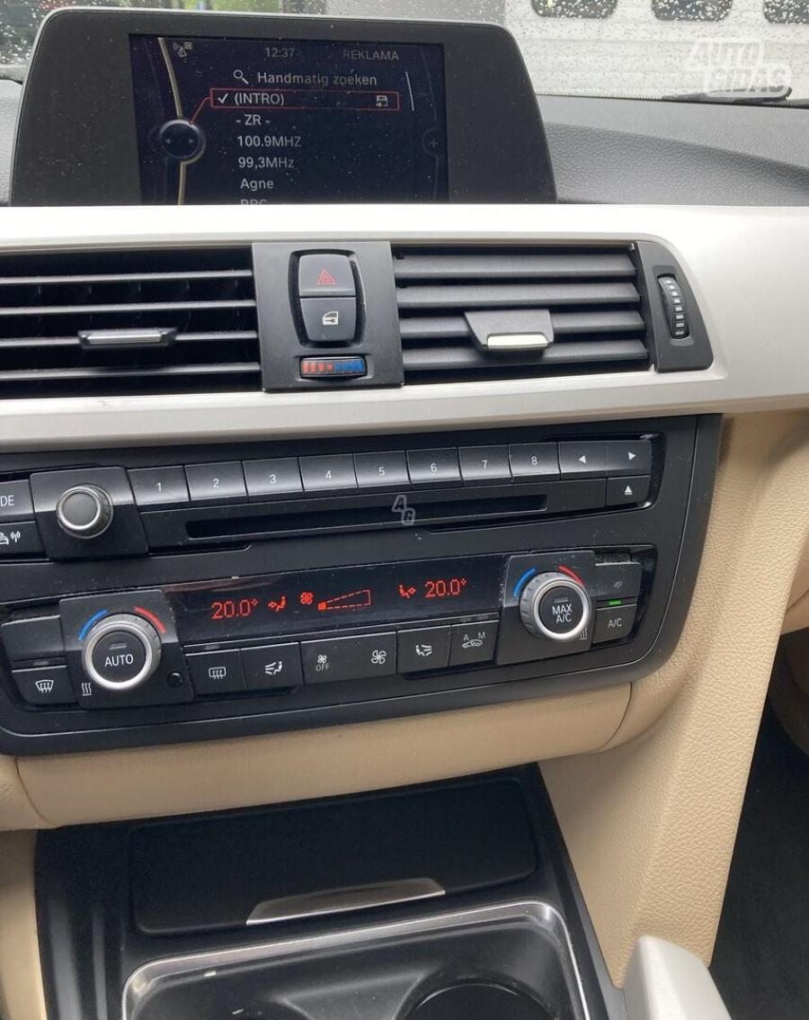 Black BMW 320 2013 in Vilnius, with an engine capacity of 2.00 L and mileage of 295 thousand km for 4899 €, photo 9 on AUTOMOTO.COM.LV