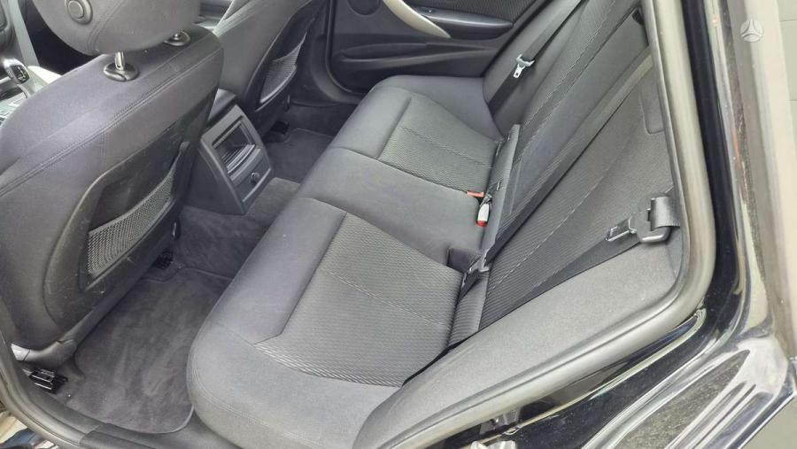Black BMW 320 2013 in Kaunas, with an engine capacity of 2.00 L and mileage of 340 thousand km for 6650 €, photo 13 on AUTOMOTO.COM.LV