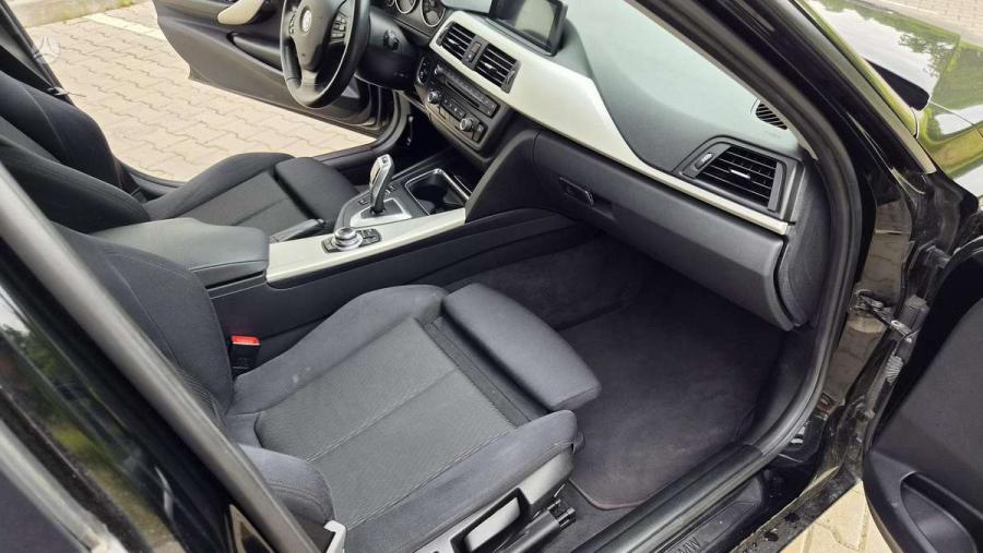 Black BMW 320 2013 in Kaunas, with an engine capacity of 2.00 L and mileage of 340 thousand km for 6650 €, photo 15 on AUTOMOTO.COM.LV