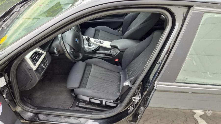 Black BMW 320 2013 in Kaunas, with an engine capacity of 2.00 L and mileage of 340 thousand km for 6650 €, photo 16 on AUTOMOTO.COM.LV