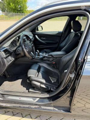 Black BMW 320 2013 in Marijampole, with an engine capacity of 2.00 L and mileage of 290 thousand km for 7800 €, photo 10 on AUTOMOTO.COM.LV