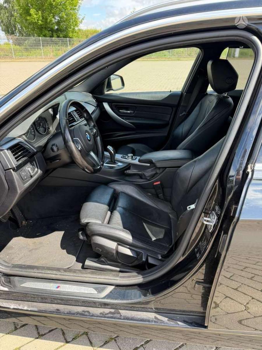 Black BMW 320 2013 in Marijampole, with an engine capacity of 2.00 L and mileage of 290 thousand km for 7800 €, photo 10 on AUTOMOTO.COM.LV