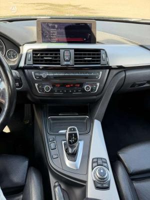 Black BMW 320 2013 in Marijampole, with an engine capacity of 2.00 L and mileage of 290 thousand km for 7800 €, photo 11 on AUTOMOTO.COM.LV