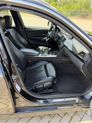 Black BMW 320 2013 in Marijampole, with an engine capacity of 2.00 L and mileage of 290 thousand km for 7800 €, photo 12 on AUTOMOTO.COM.LV