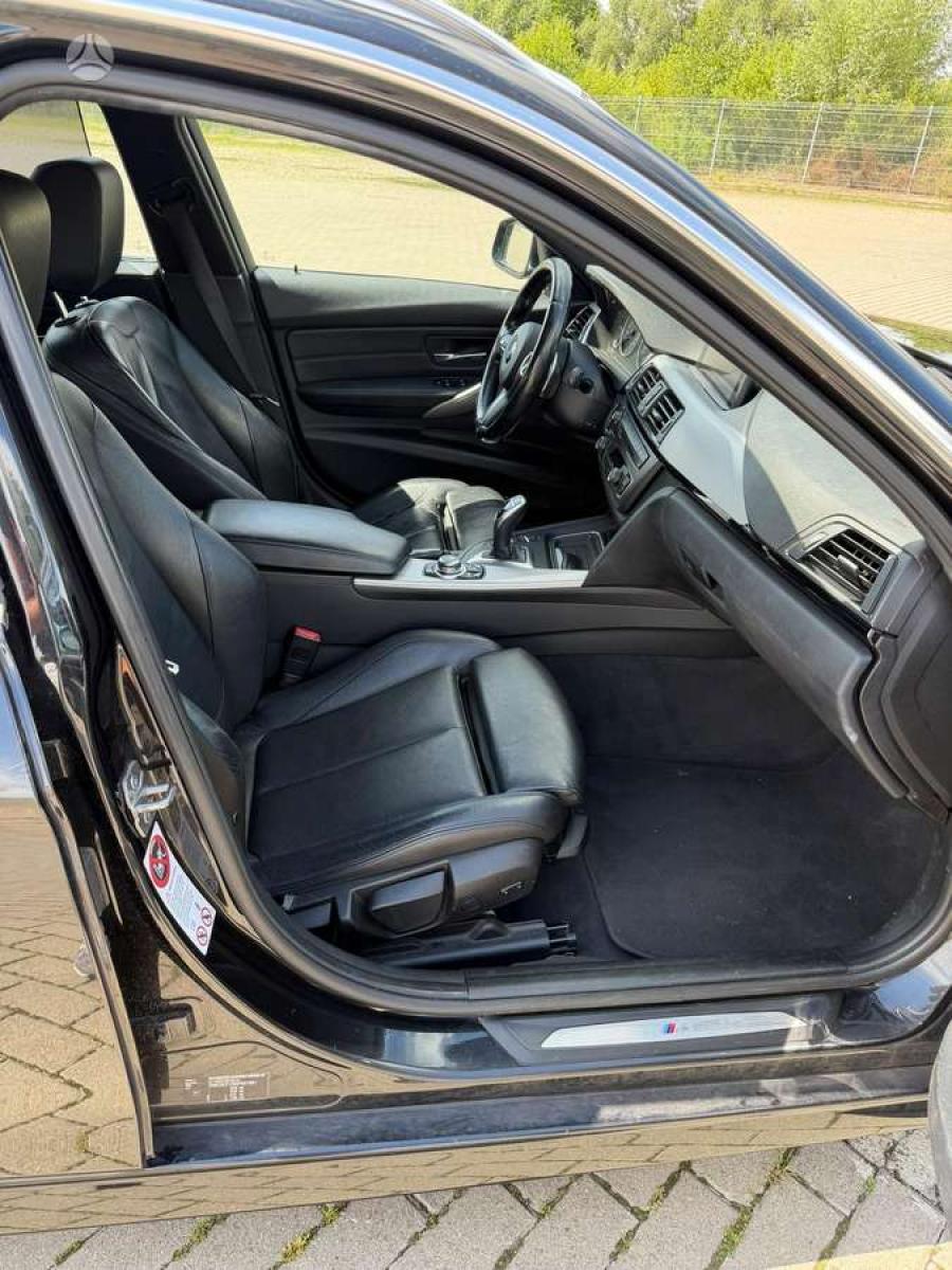 Black BMW 320 2013 in Marijampole, with an engine capacity of 2.00 L and mileage of 290 thousand km for 7800 €, photo 12 on AUTOMOTO.COM.LV