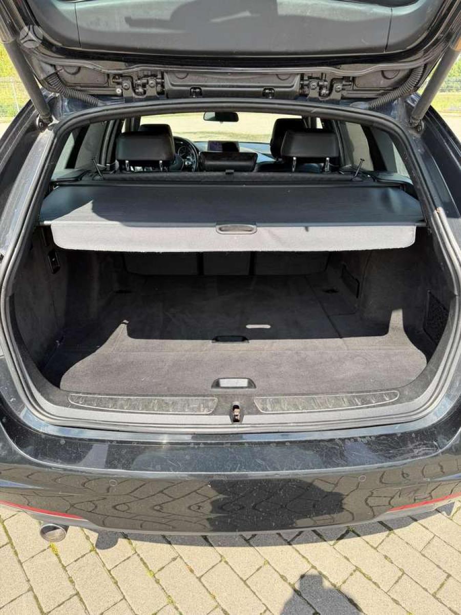 Black BMW 320 2013 in Marijampole, with an engine capacity of 2.00 L and mileage of 290 thousand km for 7800 €, photo 18 on AUTOMOTO.COM.LV